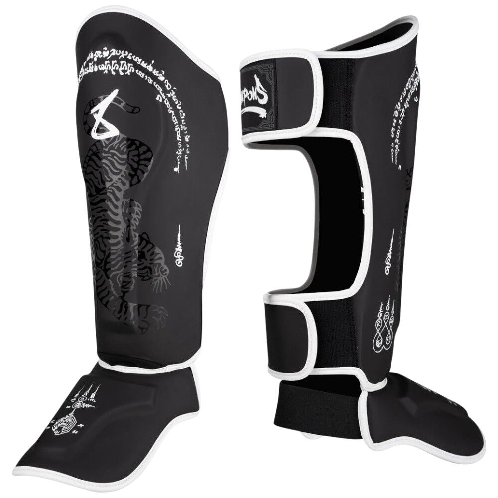 8 Weapons Sak Yant Big Tiger Black Shin Guards at FightHQ