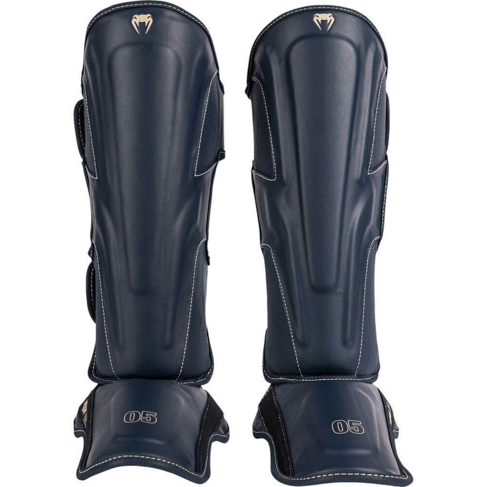 Venum Impact Evo Icy Blue Shin Guards at FightHQ